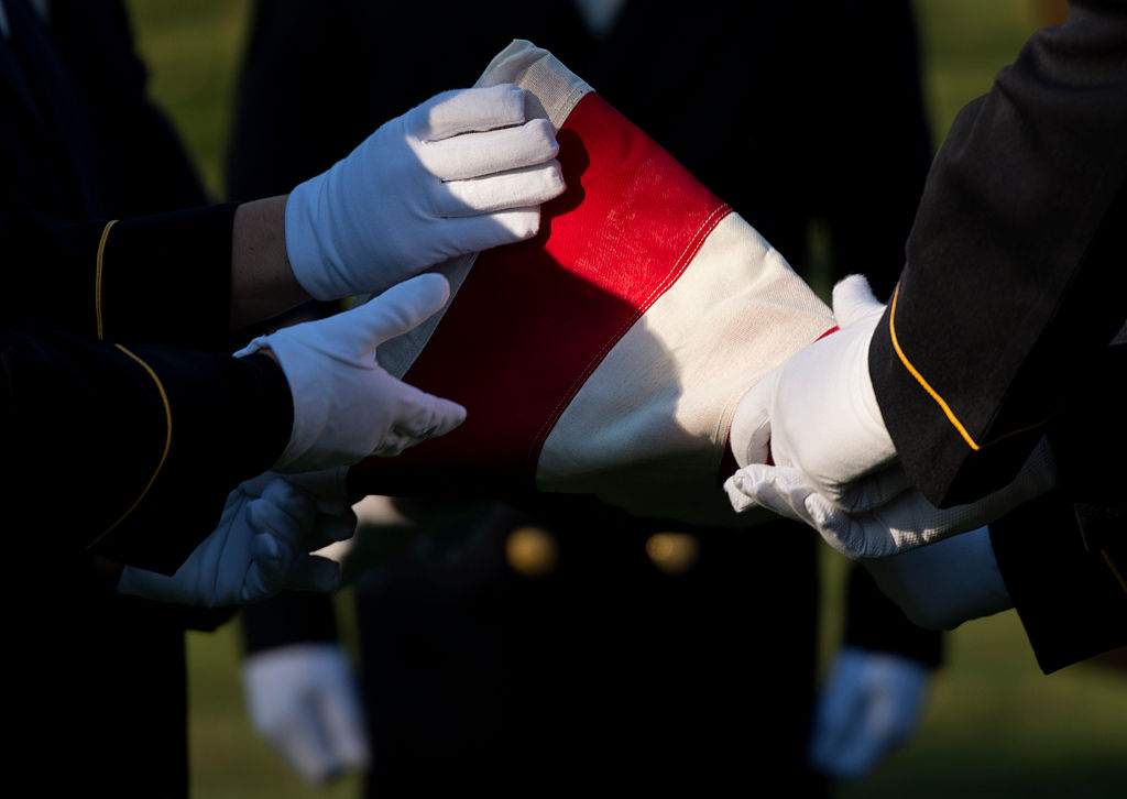 The solemn act of raising a flag - Experience Magazine